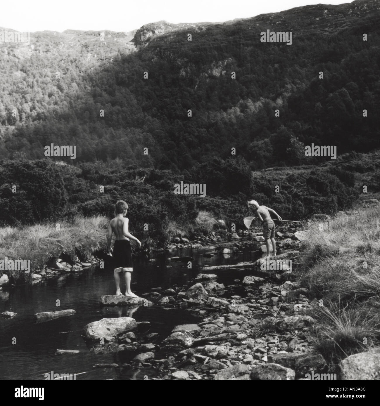 Two Kids playing in the riverside Stock Photo - Alamy Two Kids playing in the riverside Stock Photo - Alamy
