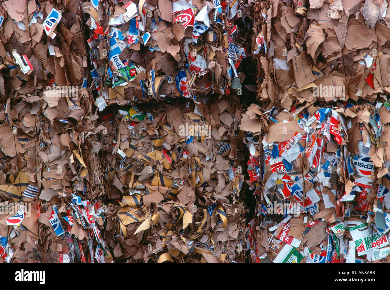 Compressing paper bales at recycling plant Stock Photo - Alamy