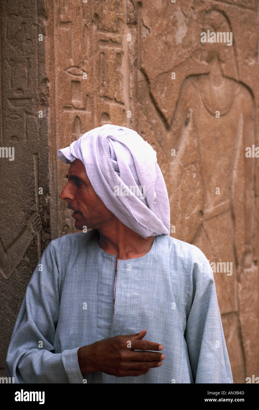 Egyptian guard and or tourist guide at archaeological site in Luxor ...