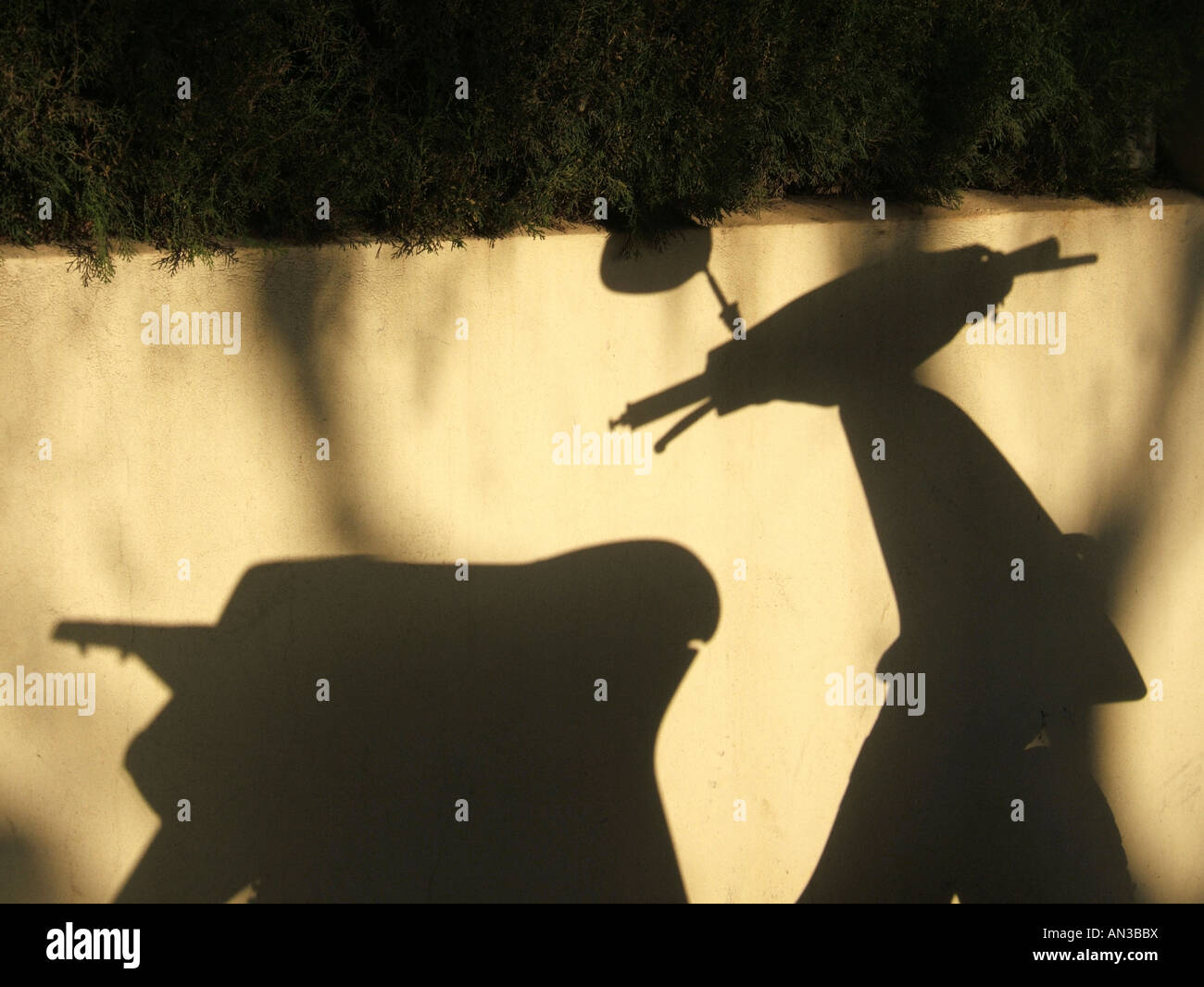 Shadow of motorcycle on a wall Stock Photo - Alamy