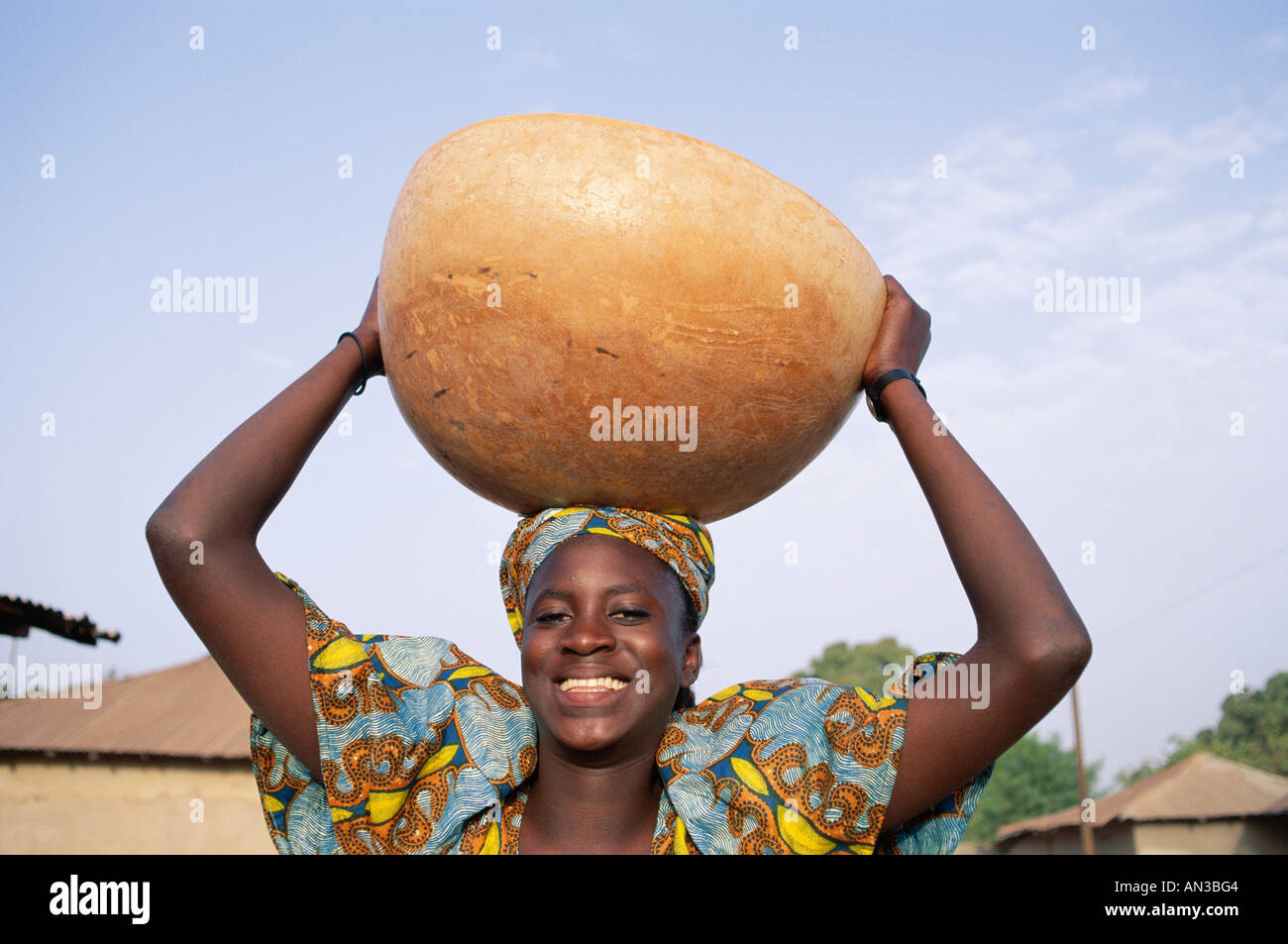 African woman carrying gourd on hi-res stock photography and images - Alamy
