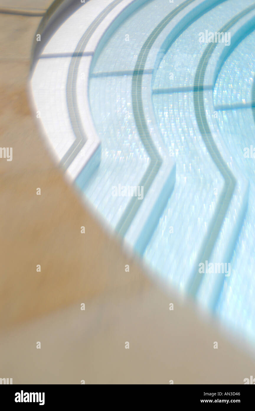Pool steps at a spa resort Stock Photo - Alamy