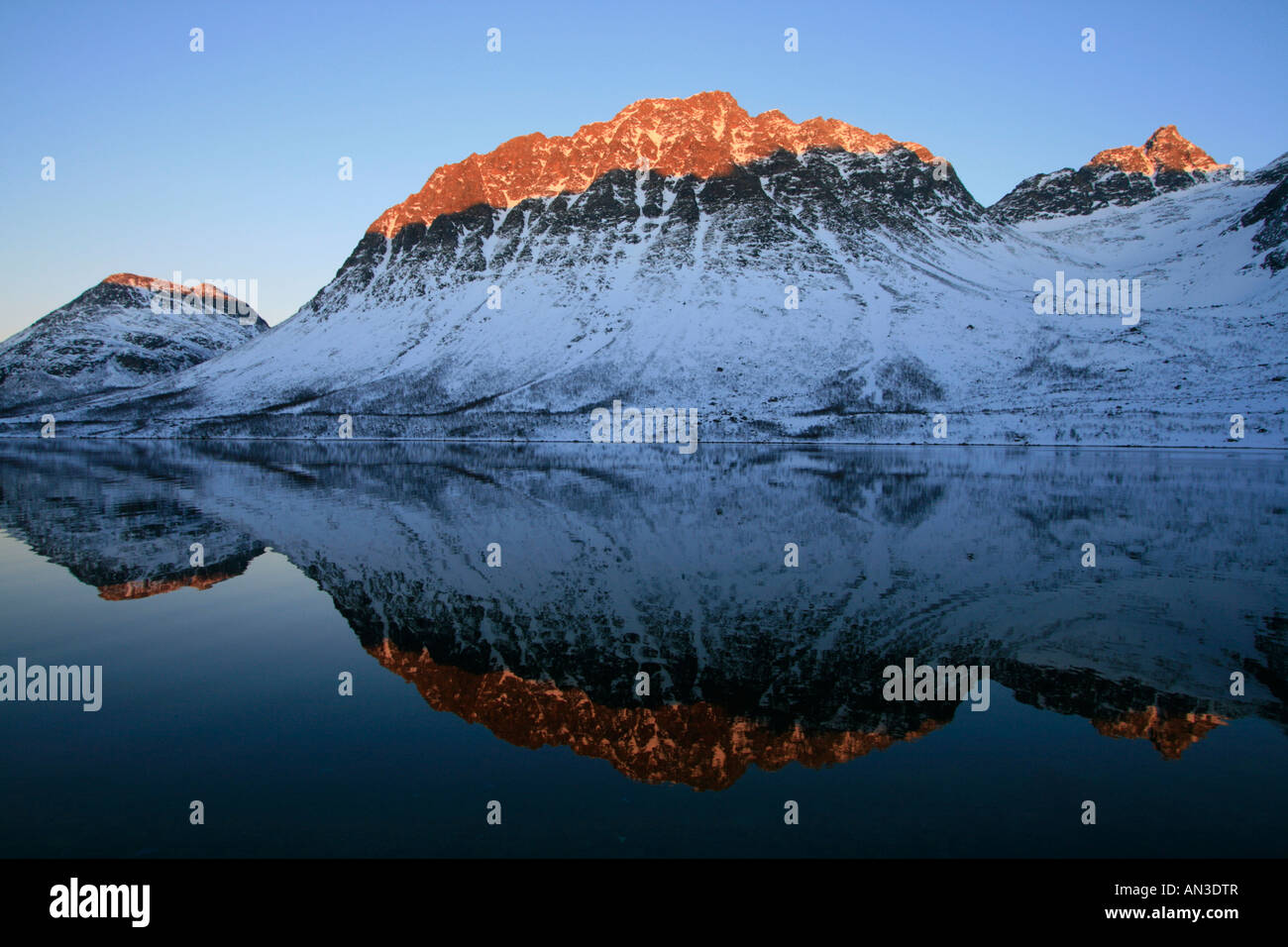 fjord reflections grotfjorden last light on mountain summit tromso ...