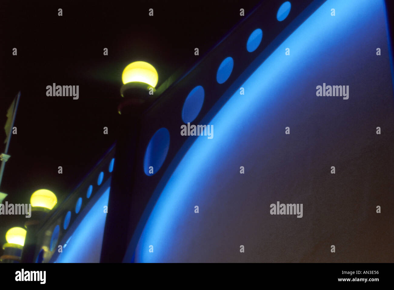 Blue arch and yellow lamps Stock Photo - Alamy