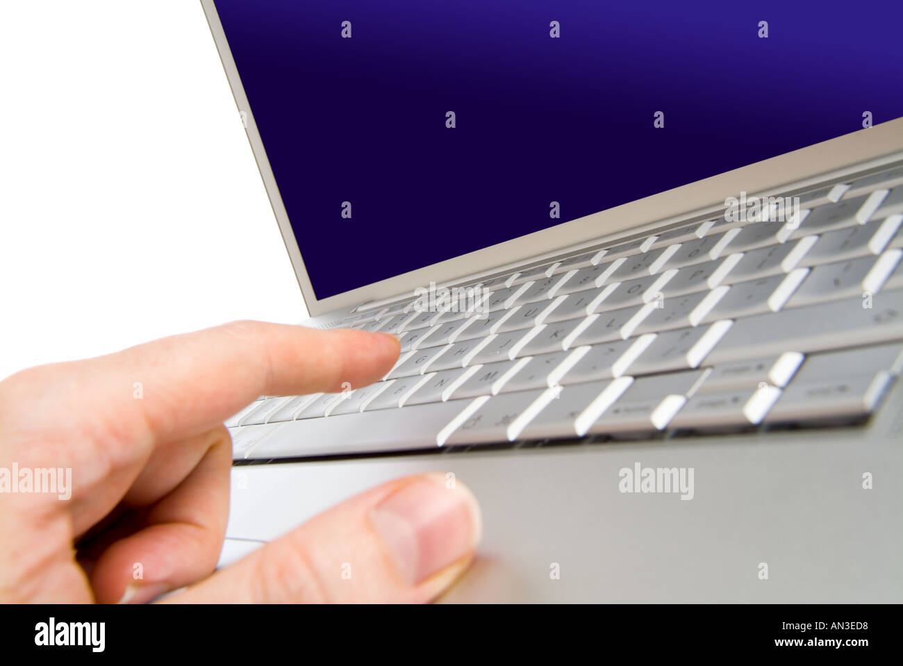 Typing on laptop keyboard man Cut Out Stock Images & Pictures - Alamy