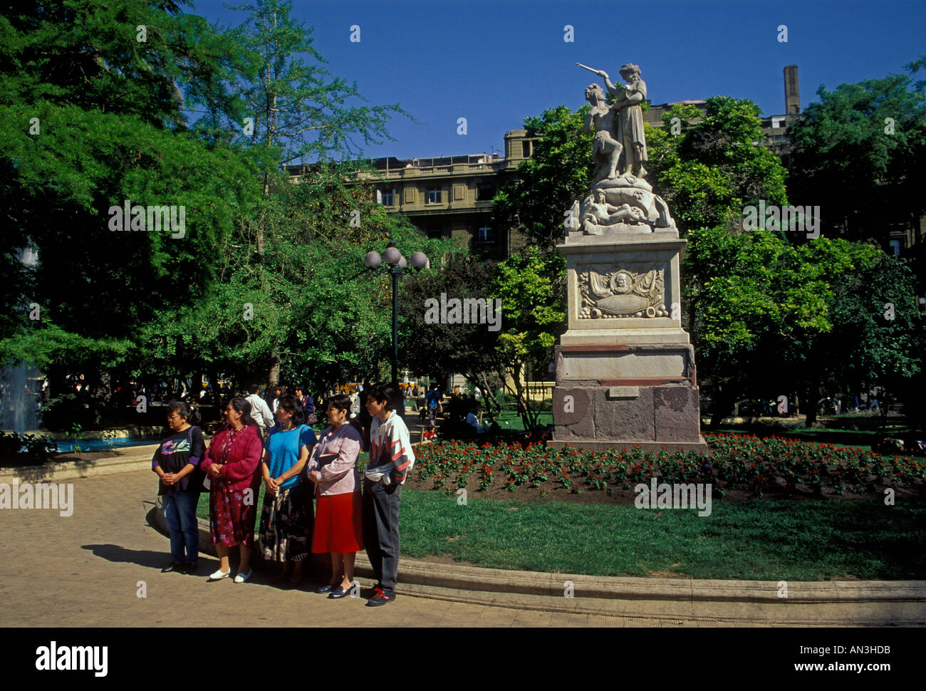 Chilean Chileans people person adult men women family with statue of ...