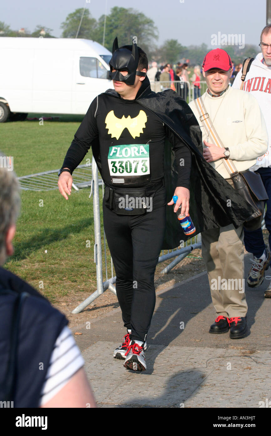 Batman fancy dress runner Stock Photo - Alamy