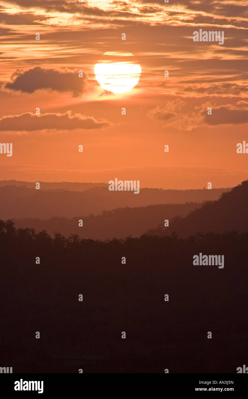 Sun setting over the Glasshouse Mountains from Wildhorse Mountain ...
