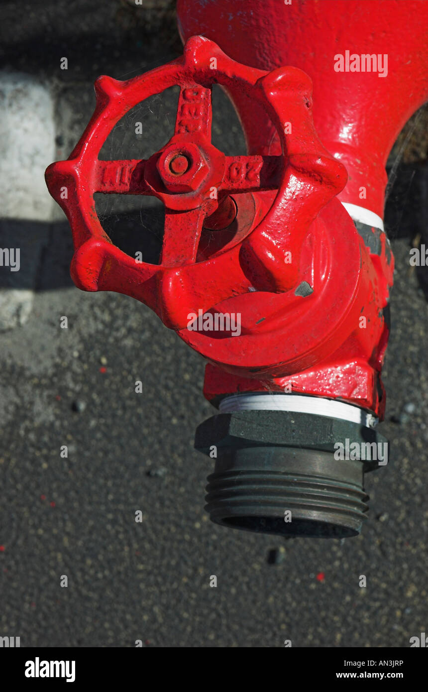 Red fire hydrants at industrial site Stock Photo - Alamy