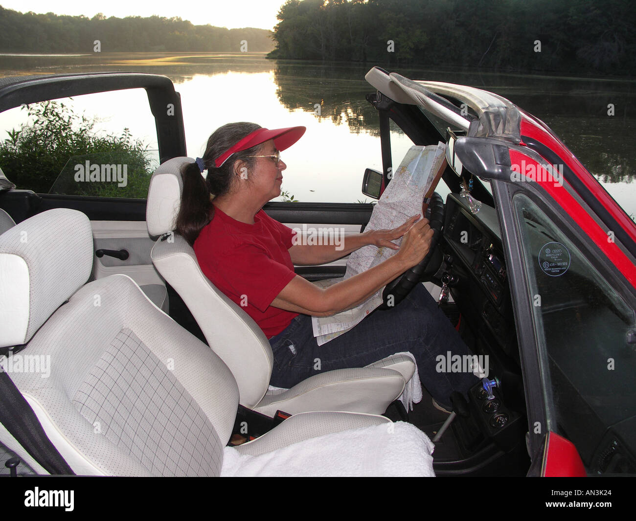 Reading Map in Car confused Stock Photo - Alamy
