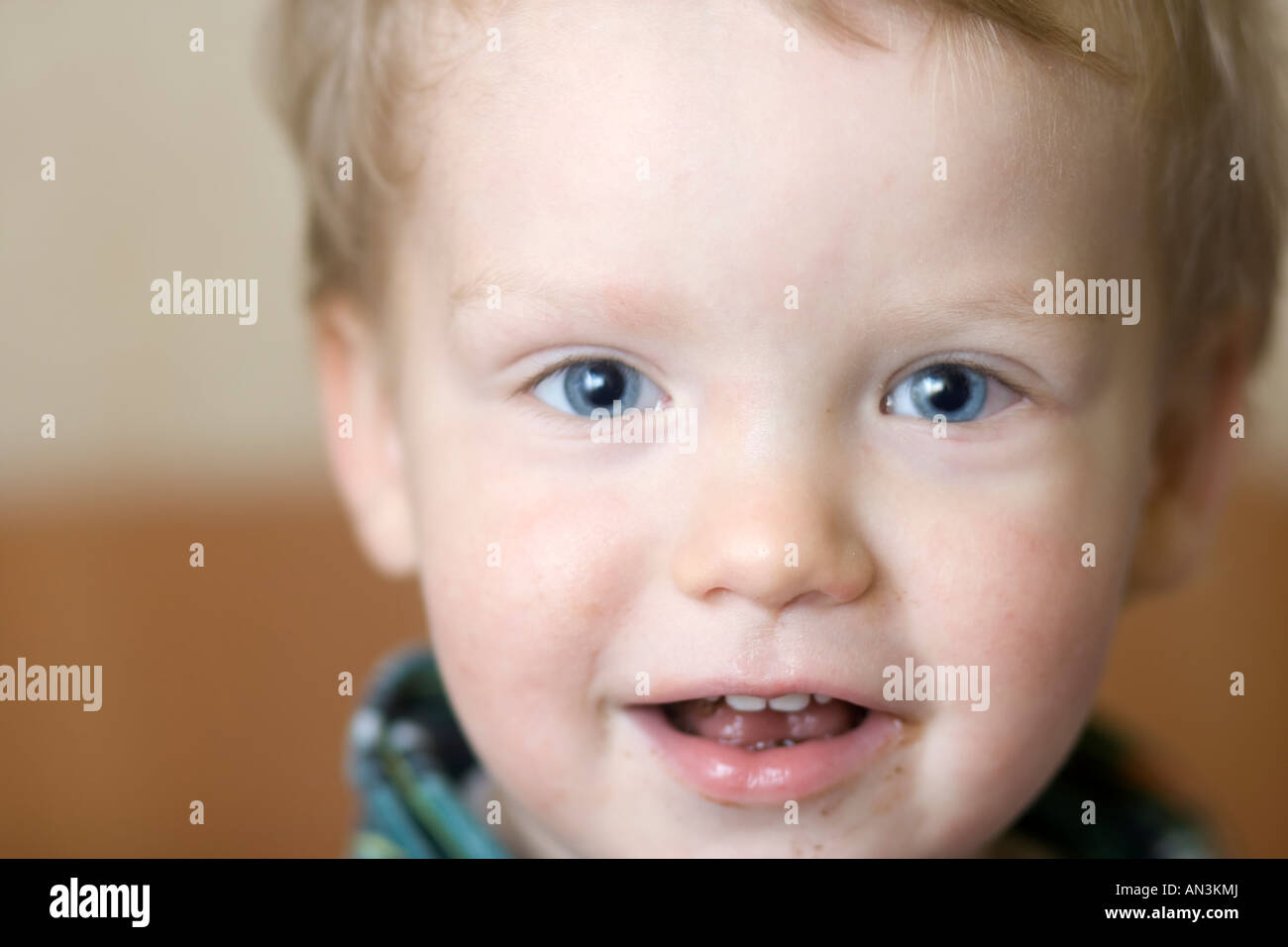 Small boy facial close up portret with chocolate indoor Stock Photo - Alamy