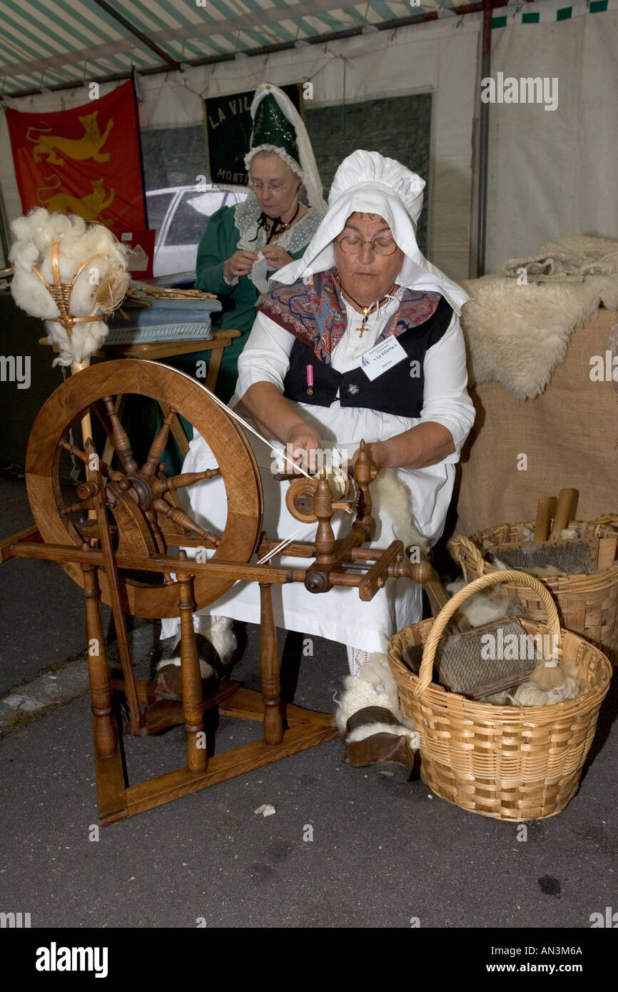 French lady spinning at Cider Fayre Caudebec en Caux on River Seine ...