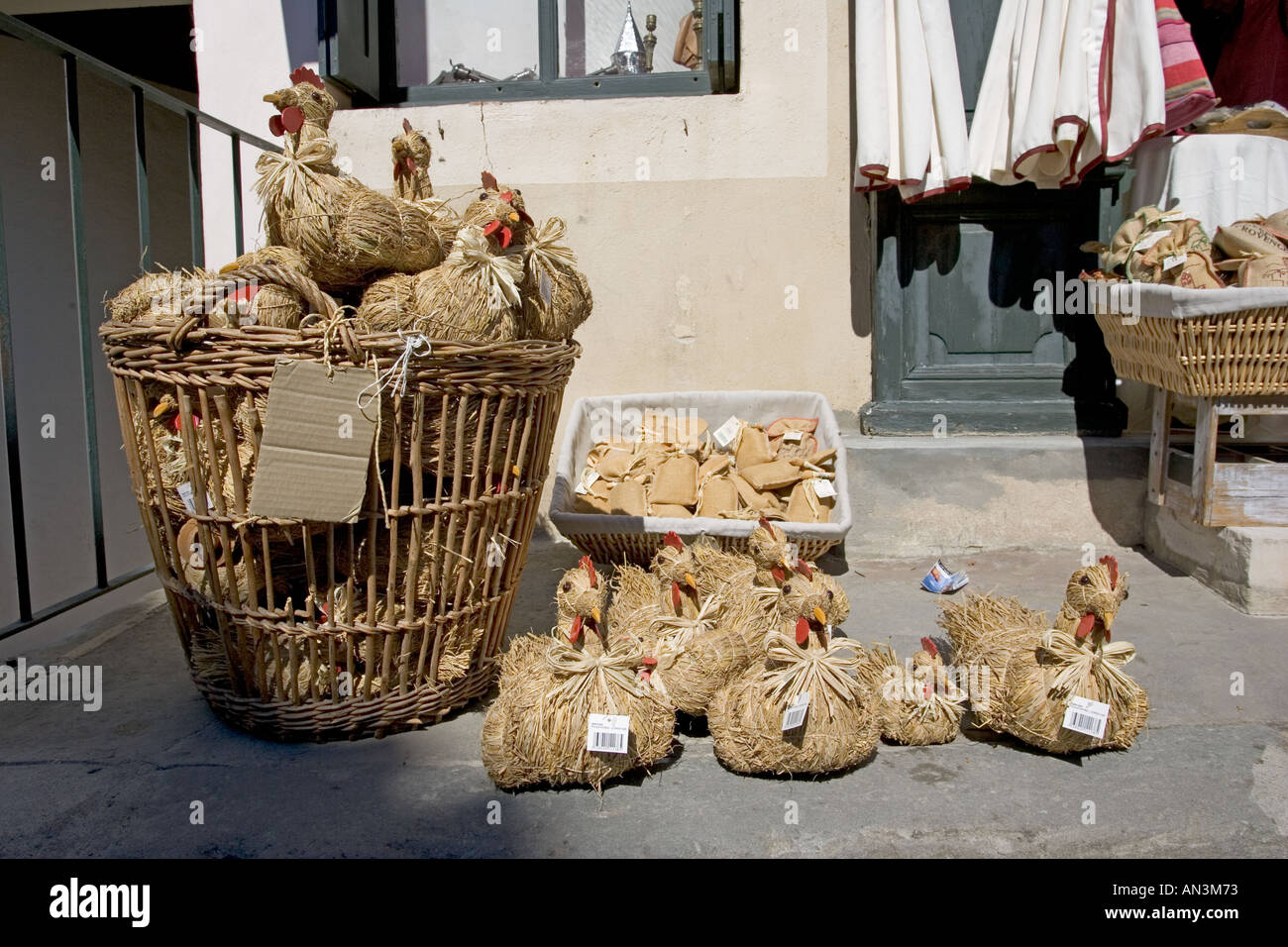 Straw chickens outside shop in ancient fortified city of Carcassonne ...