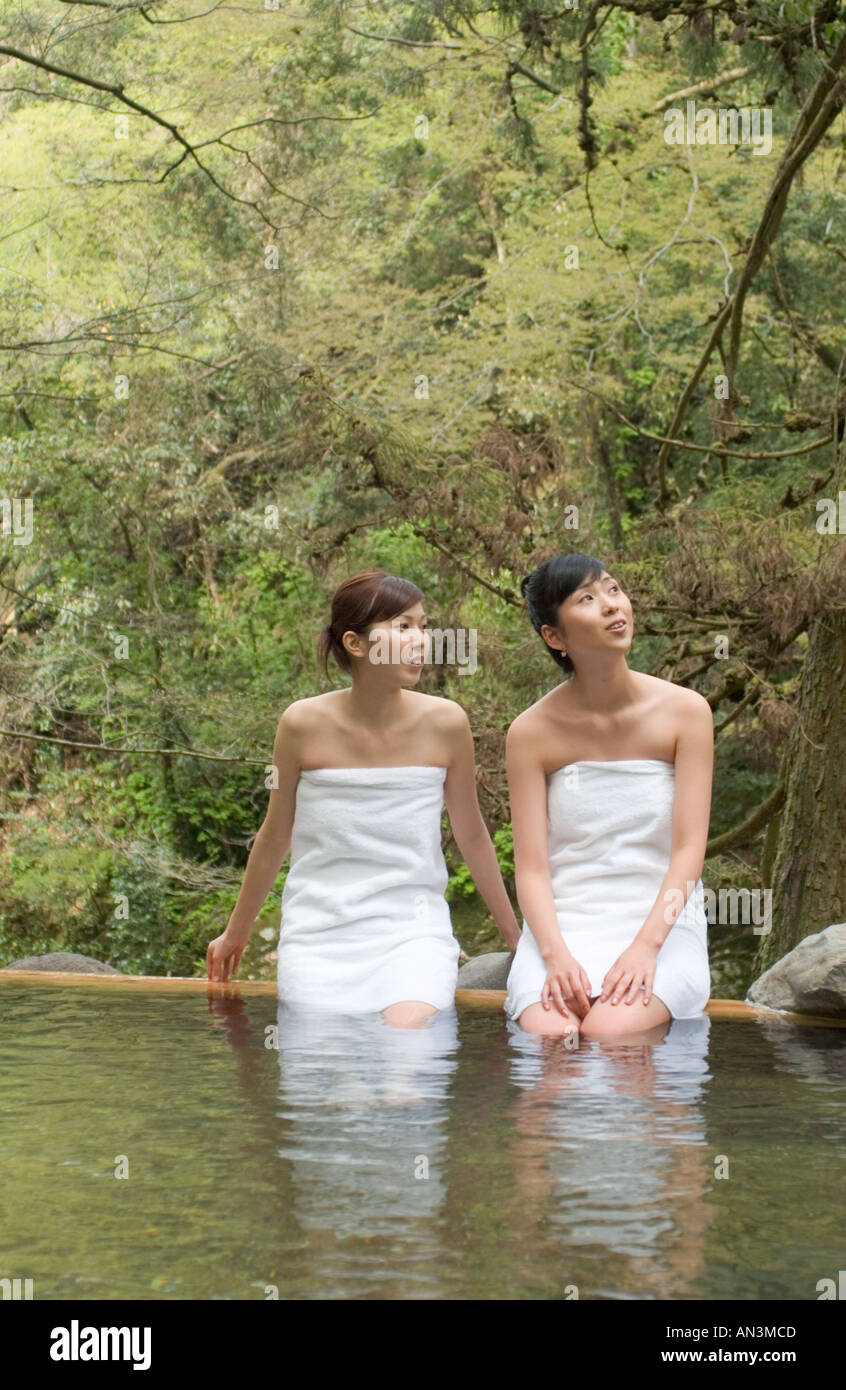 Two young women bathing in hot springs Stock Photo - Alamy
