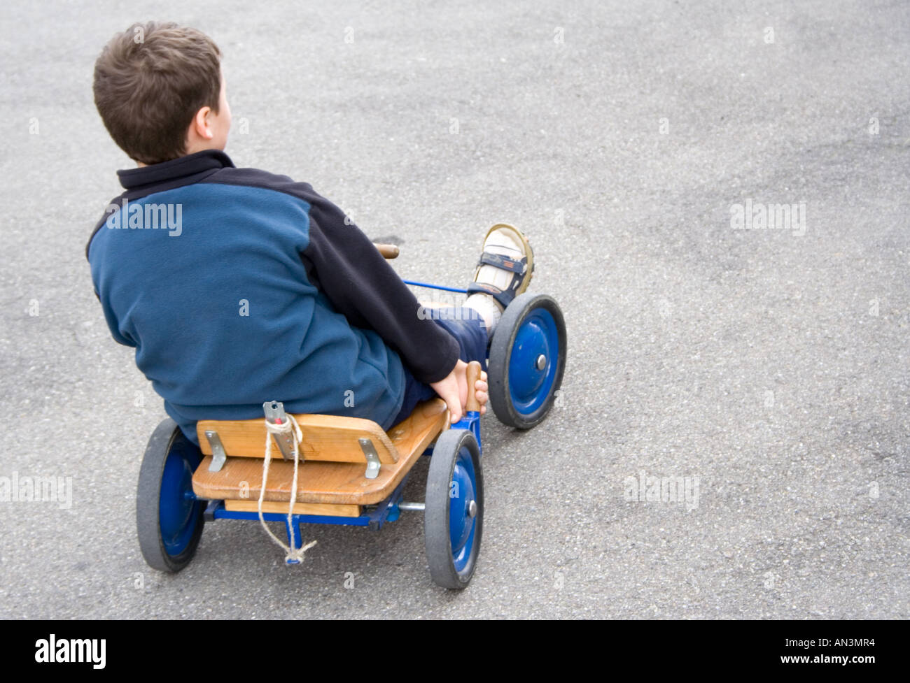 Boy in Cart Stock Photo - Alamy
