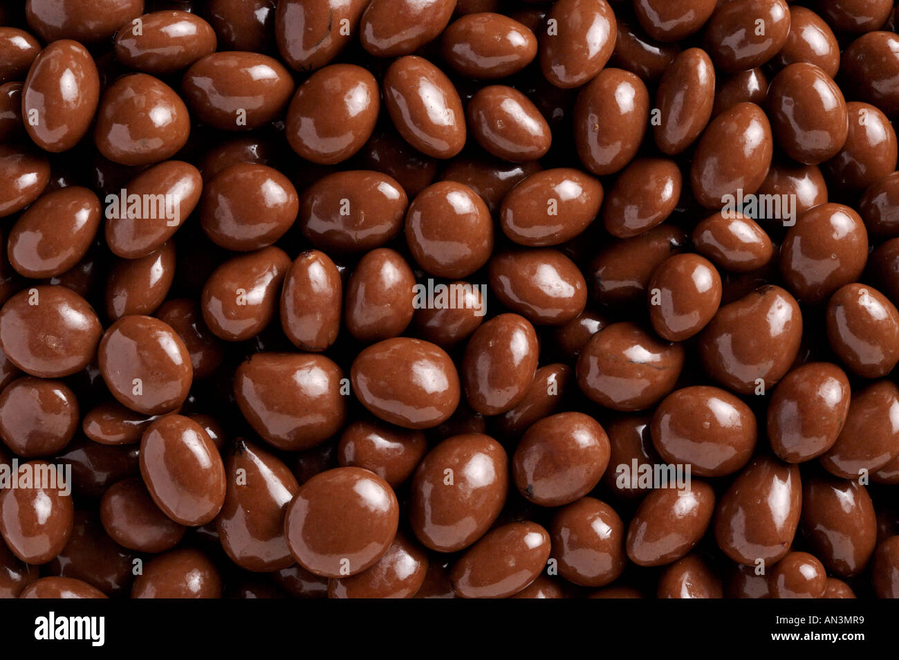 Raisins covered in chocolate Stock Photo - Alamy