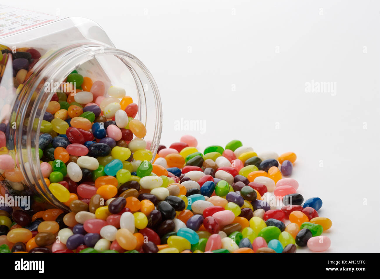 Jelly Beans sugar candy snack in a jar isolated on white Stock Photo ...