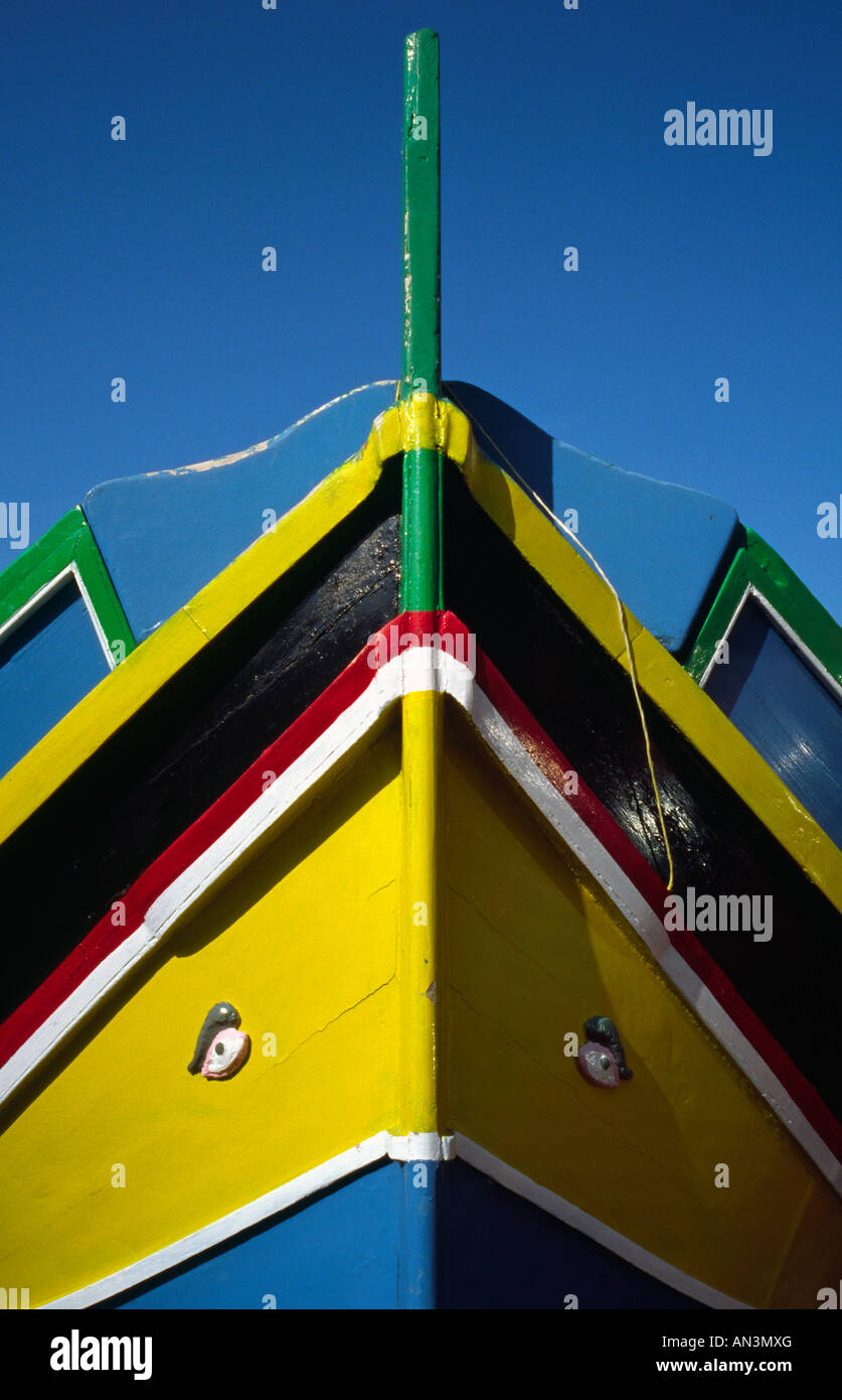 Traditional wooden Luzzu fishing boat with evil eyes at Marsalforn ...