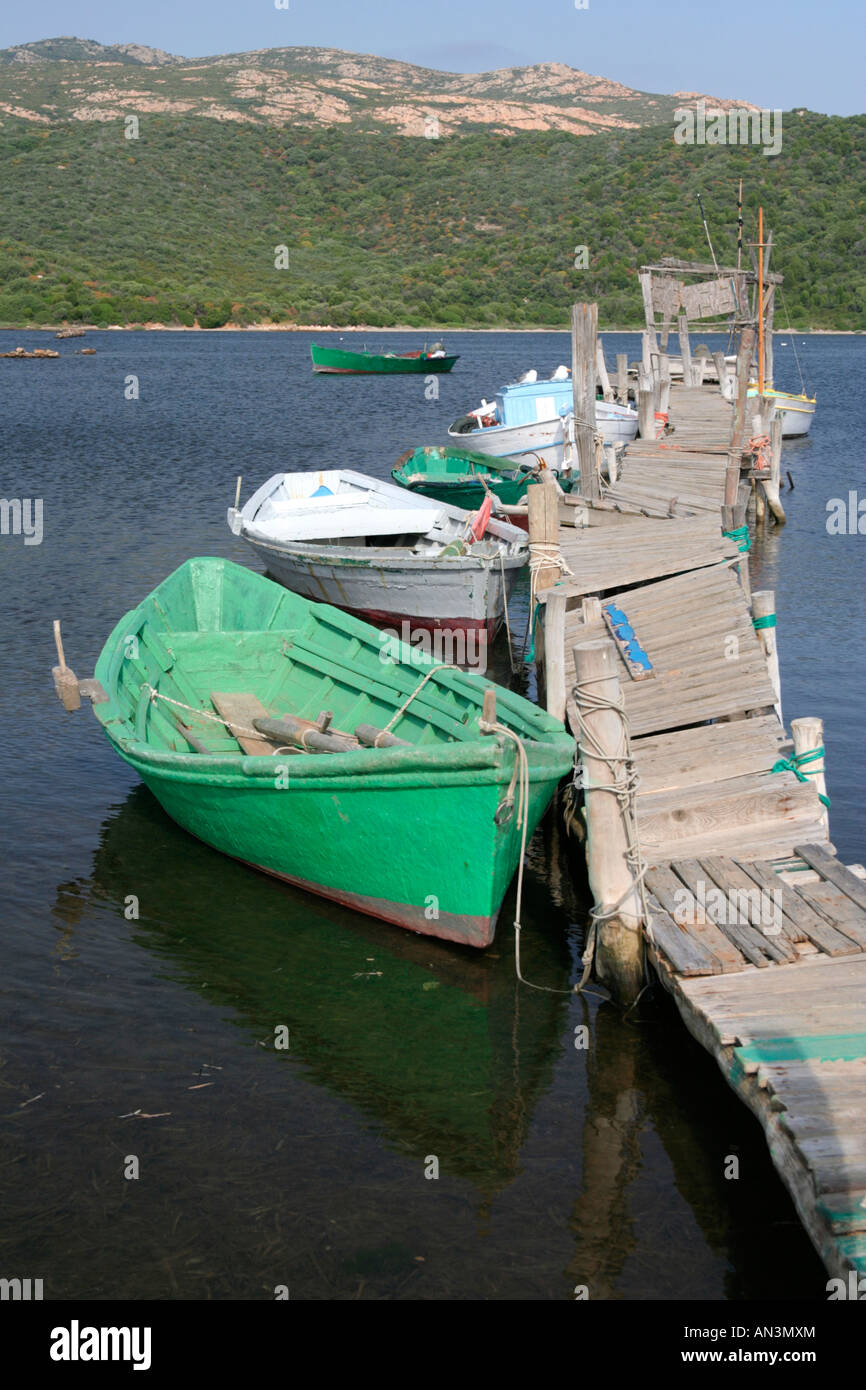 Sardinian crooked pier and boats Stock Photo - Alamy