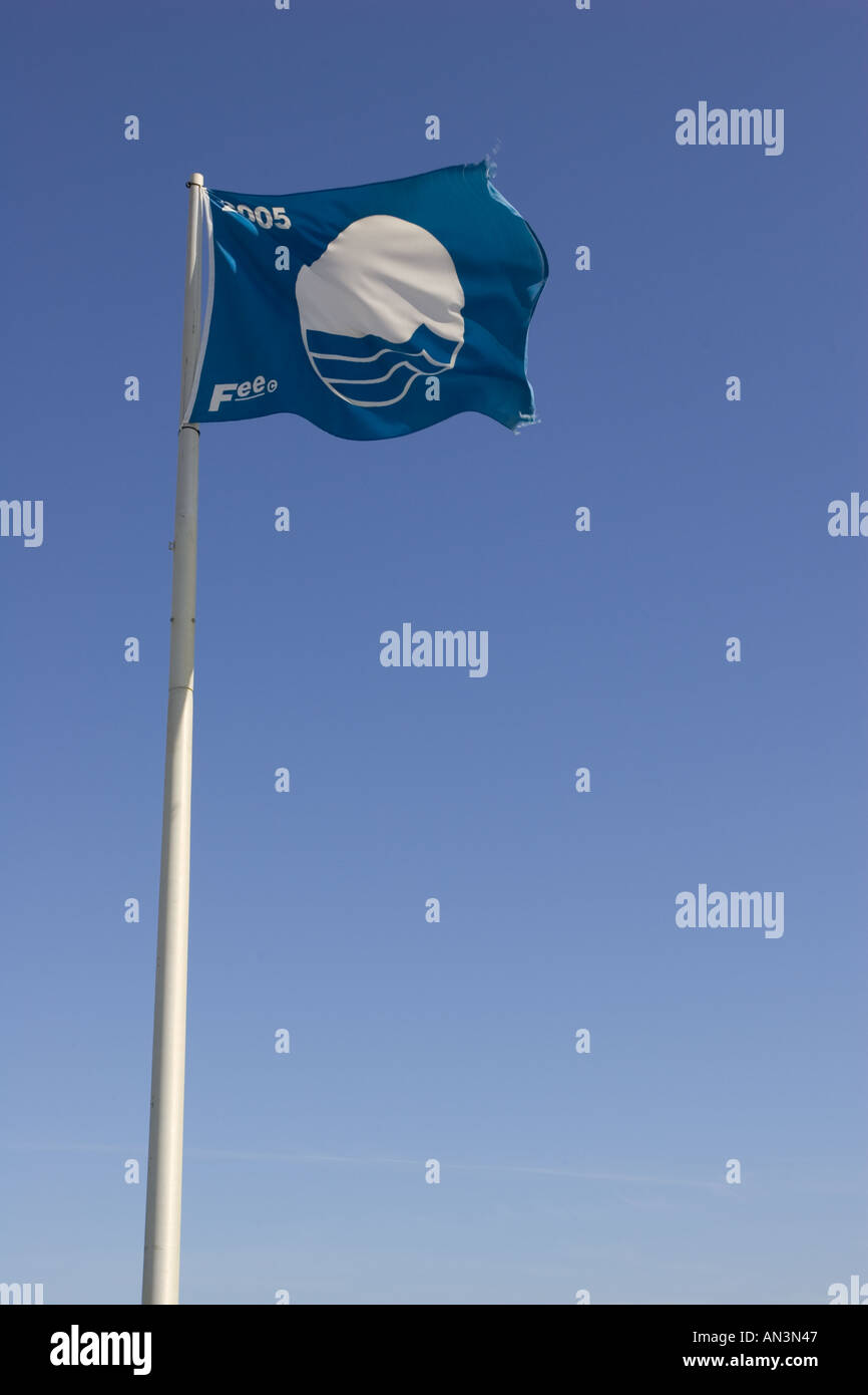 Clean beach flag flying Stock Photo - Alamy