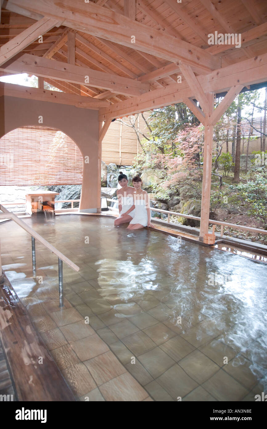Two young women bathing in hot springs Stock Photo - Alamy