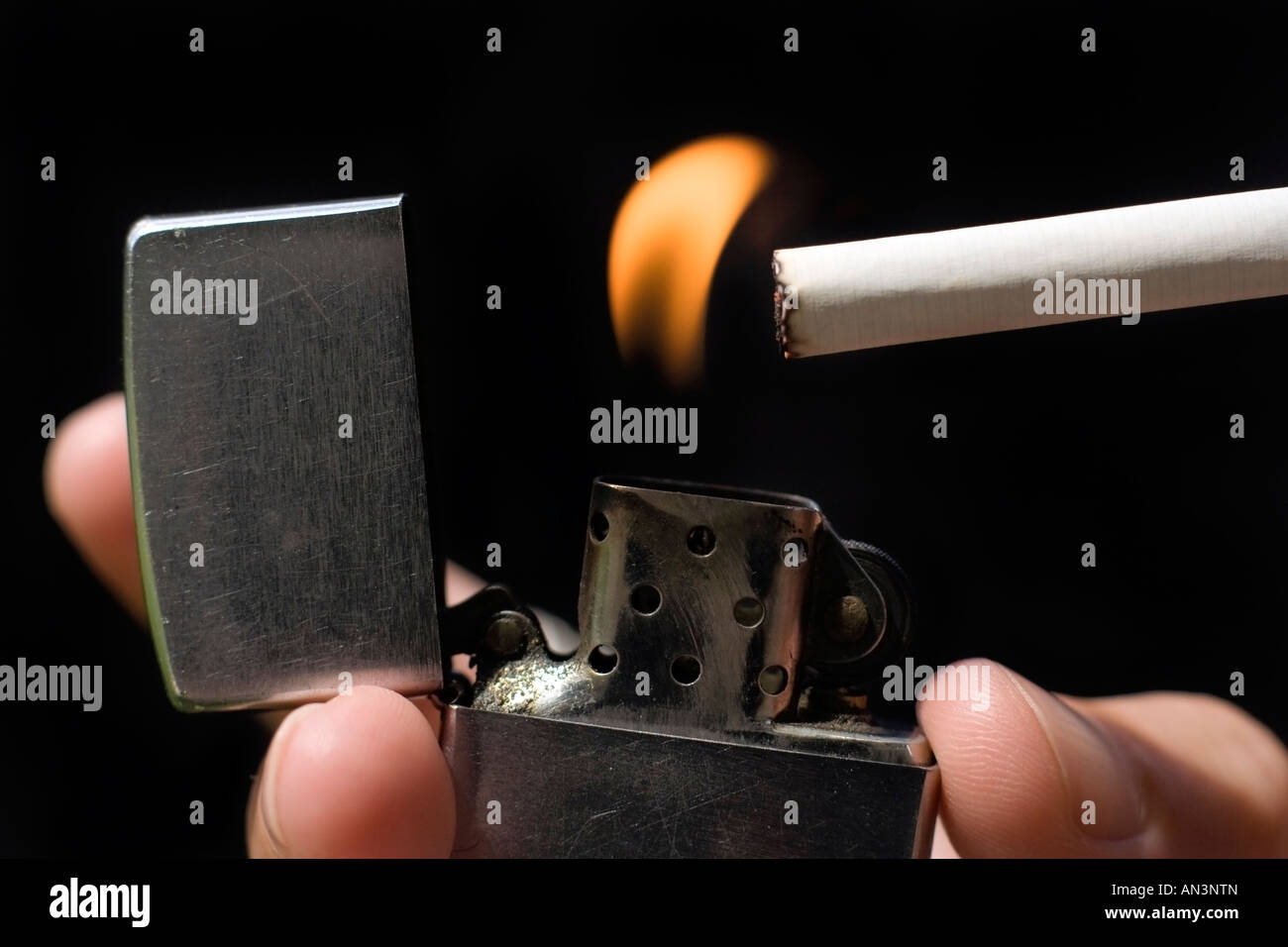 Lighting a cigarette Stock Photo - Alamy