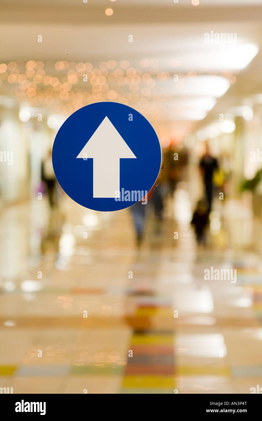 Shopping mall entrance arrow sign Stock Photo - Alamy