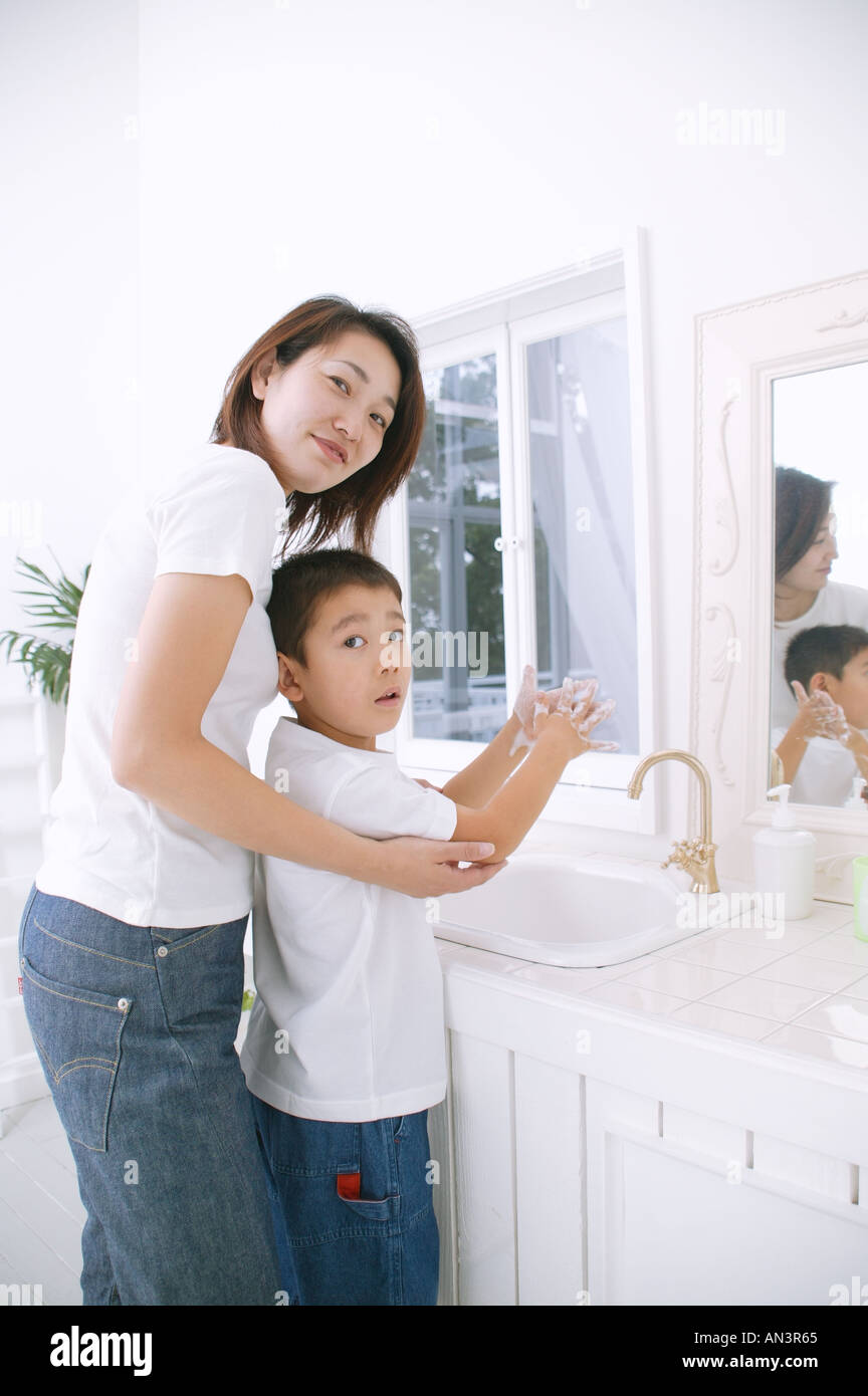 A boy washing hands Stock Photo - Alamy