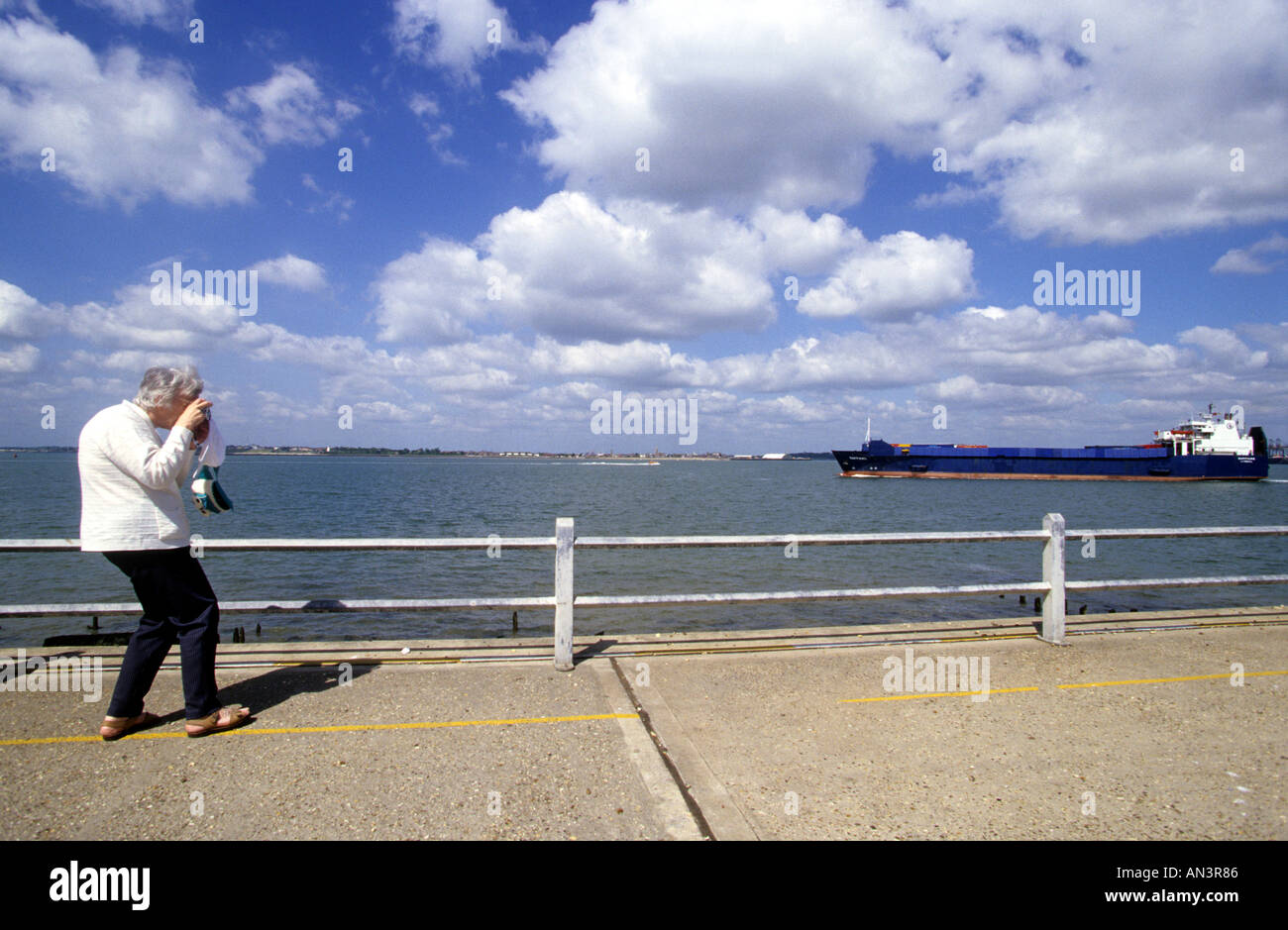 Visitor to the Port of Felixstowe viewing area taking a picture of a ...