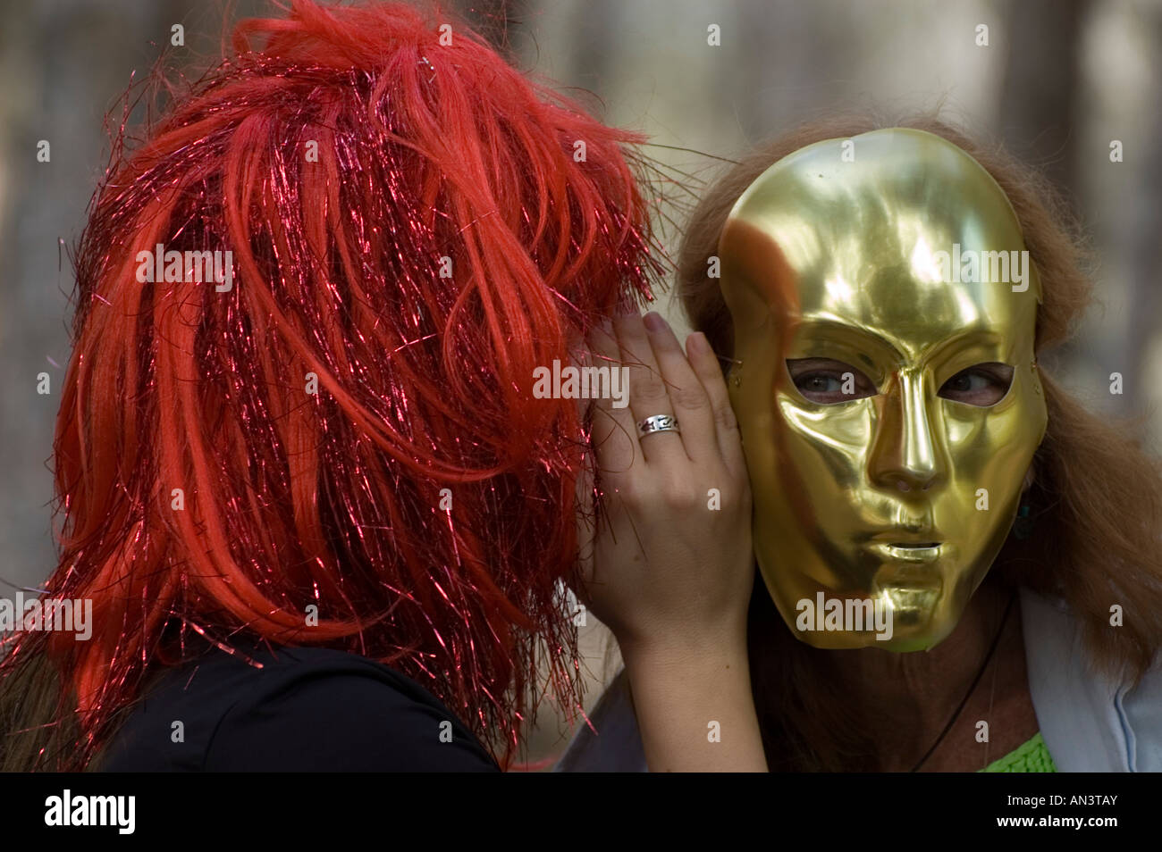 Masked actors gold mask red hair Stock Photo - Alamy