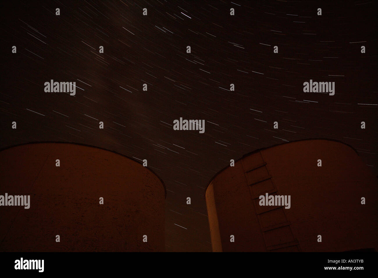 Two circular grain bins on a starlit night in scenic Saskatchewan Stock ...