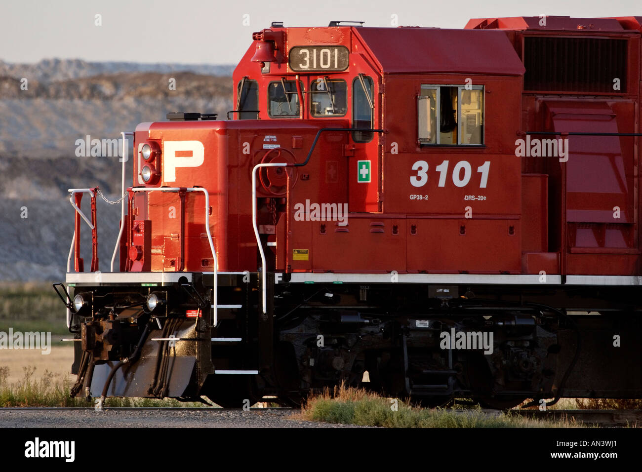 A CPR engine with a potash waste hill in background Stock Photo - Alamy