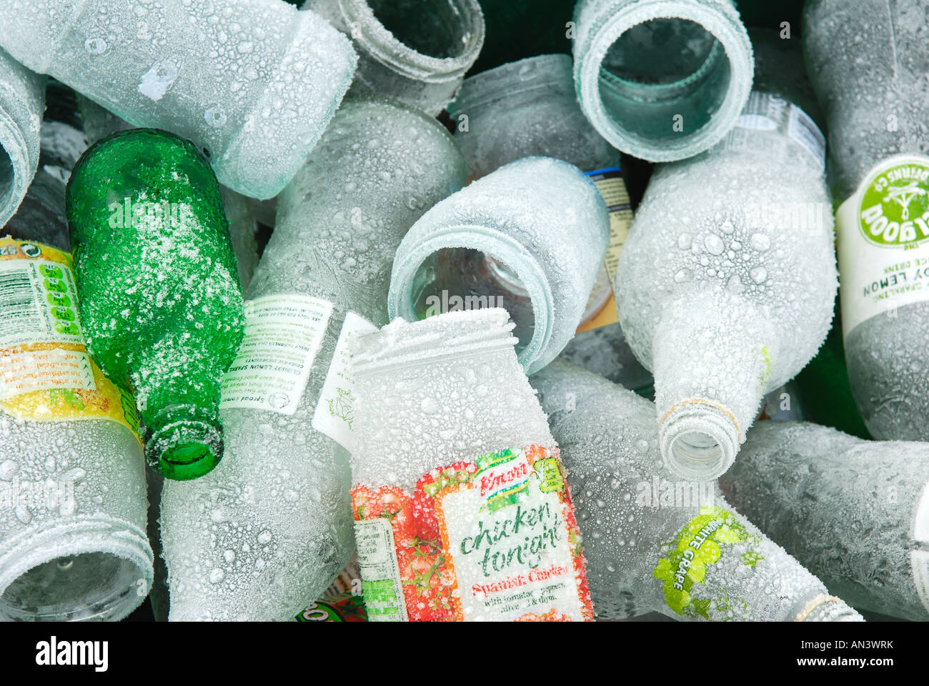 frost covered bottles and jars ready for collection to be recycled ...