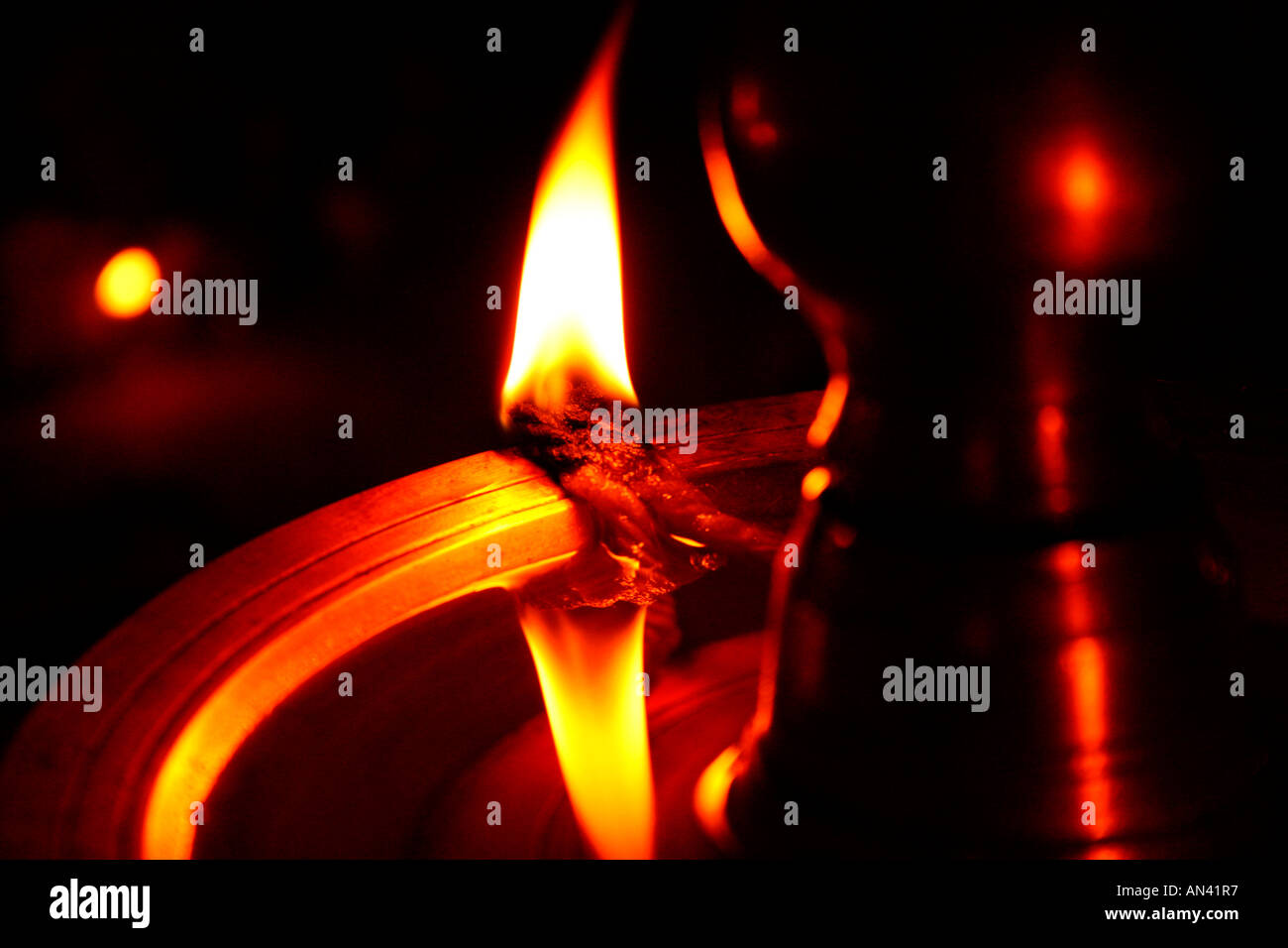 Flame from a traditional lamp in Kerala, India Stock Photo - Alamy