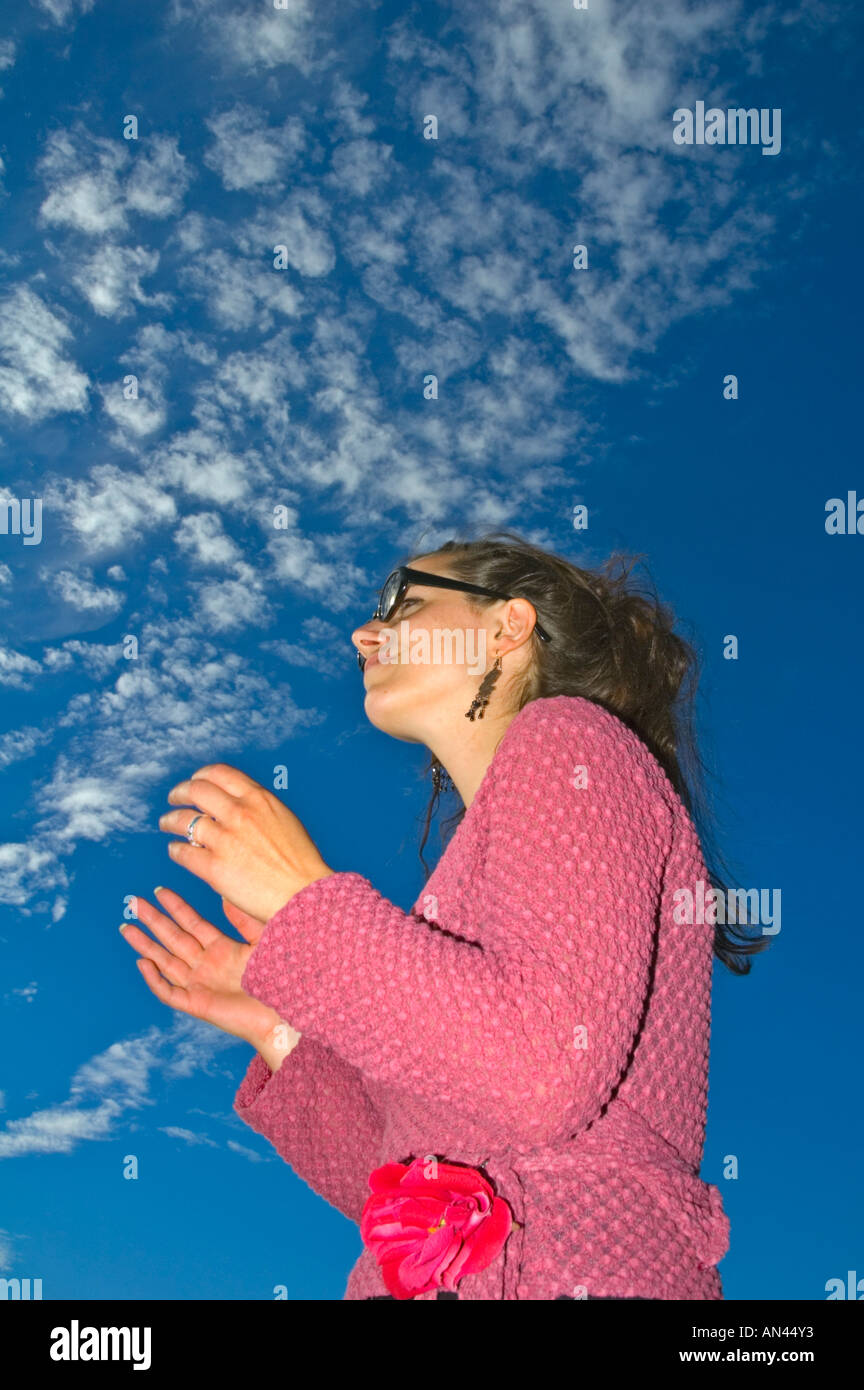 A fan clapping her hands in a concert at Pori Jazz Festival in Finland ...