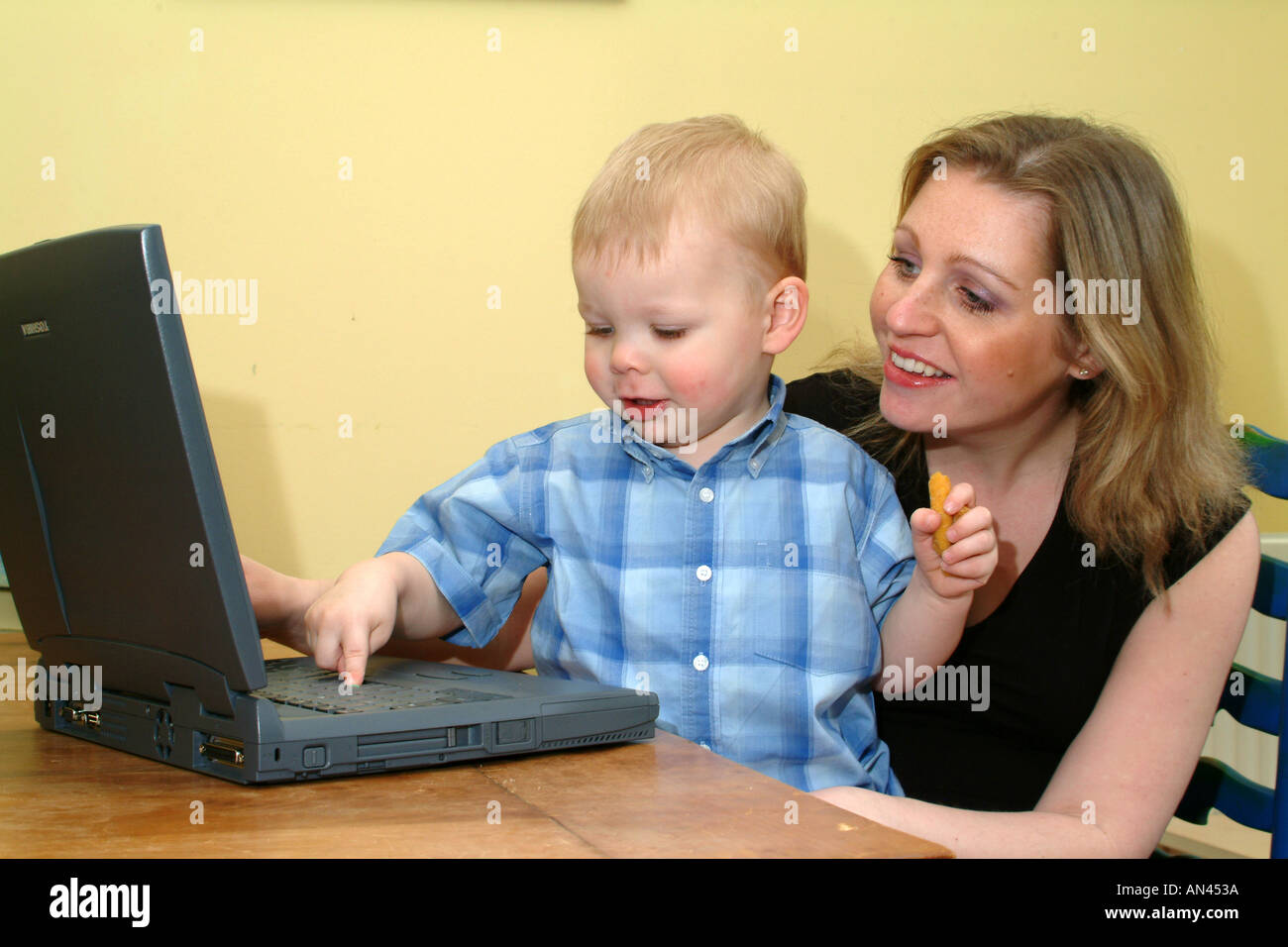 Boy using information monitor hi-res stock photography and images - Alamy