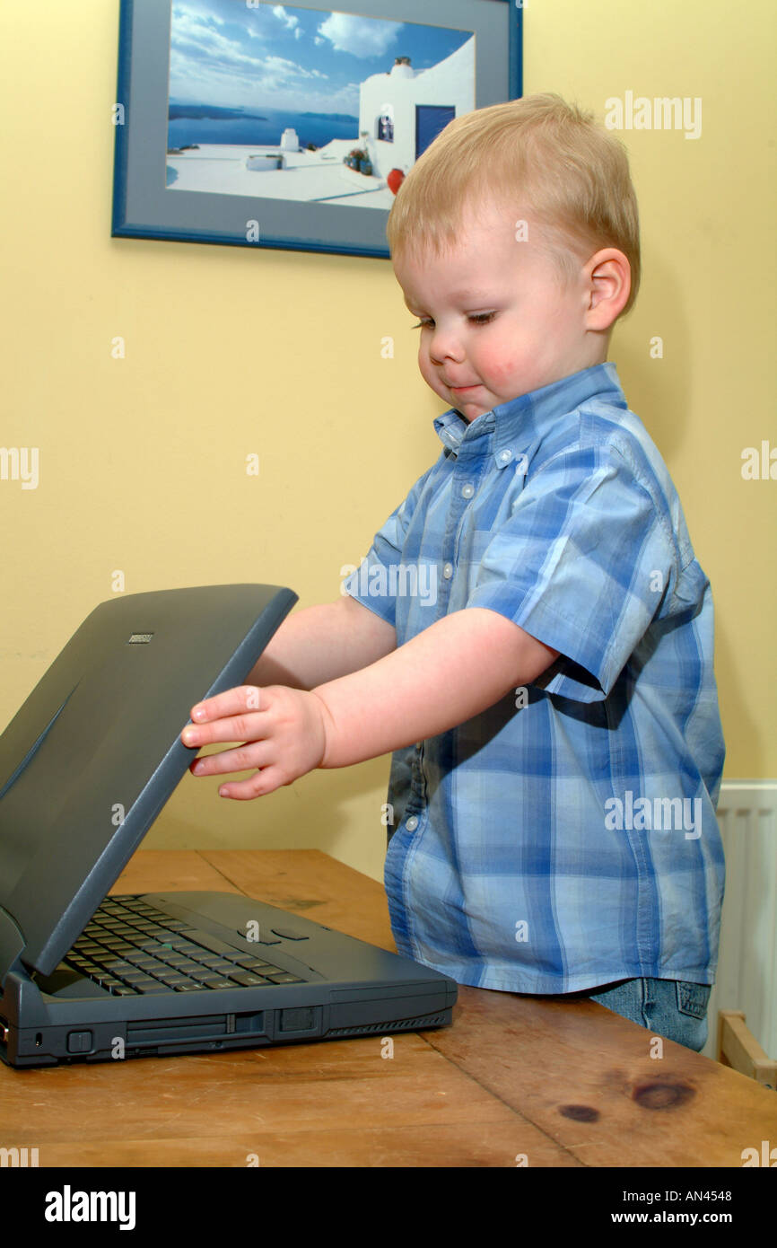 Little Boy using Laptop Computer Stock Photo - Alamy