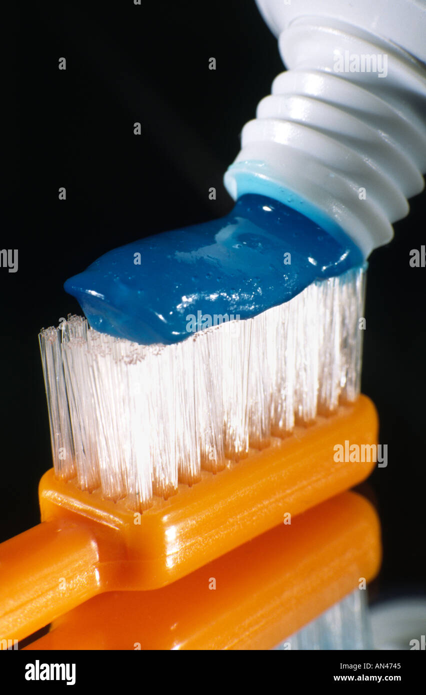 Tooth brush and blue toothpaste tube Stock Photo - Alamy