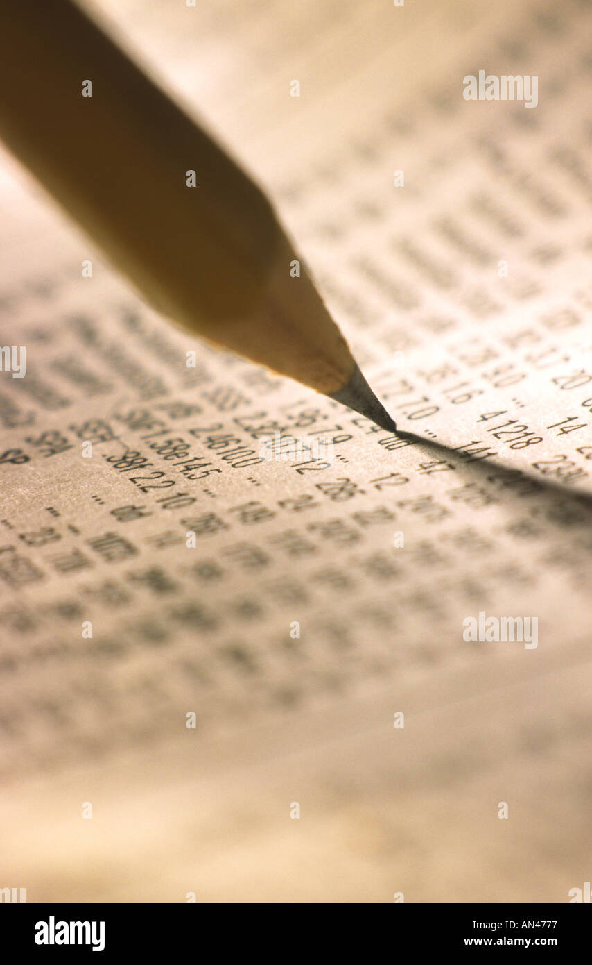 Pencil on stock page Stock Photo - Alamy