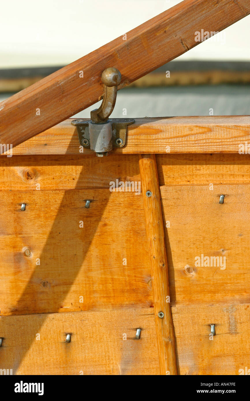 Oarlock and boarding of a wooden rowboat / skiff , Finland Stock Photo ...