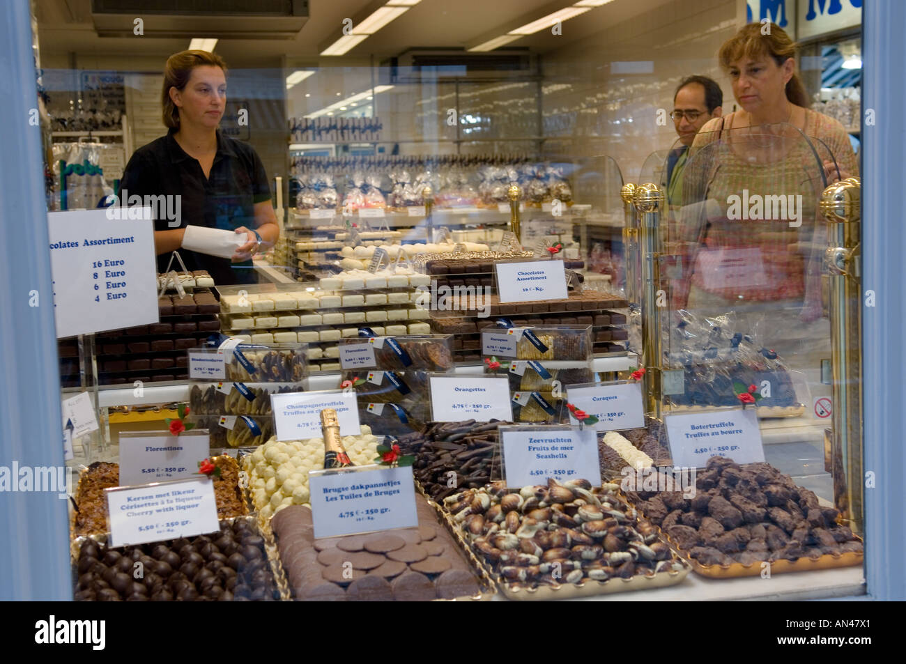Chocolate shop window in Bruges Belgium Stock Photo - Alamy