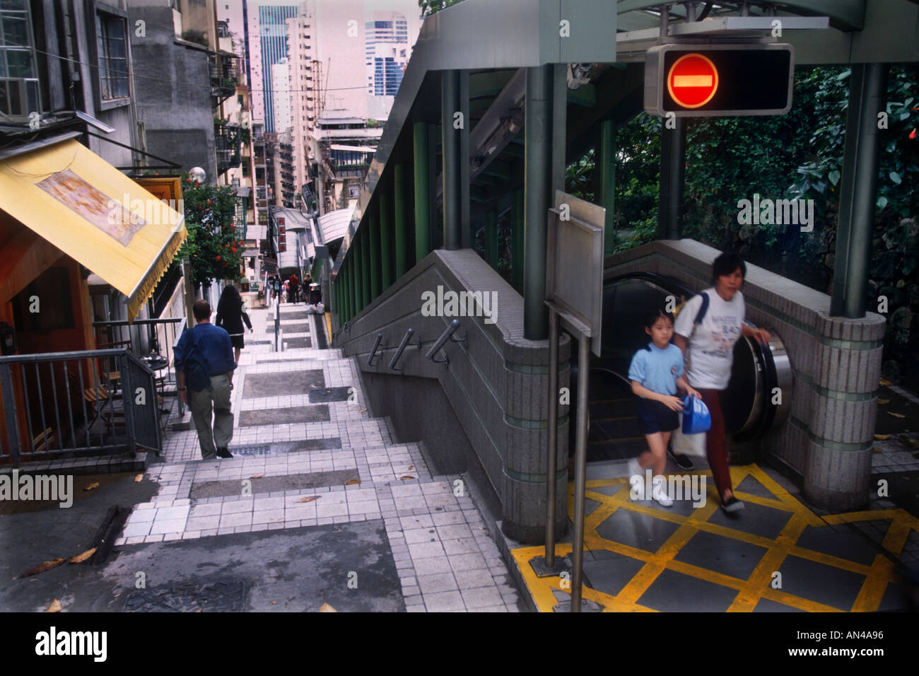 1996 Hong Kong Peoples Republic of China Mother and child get off the ...
