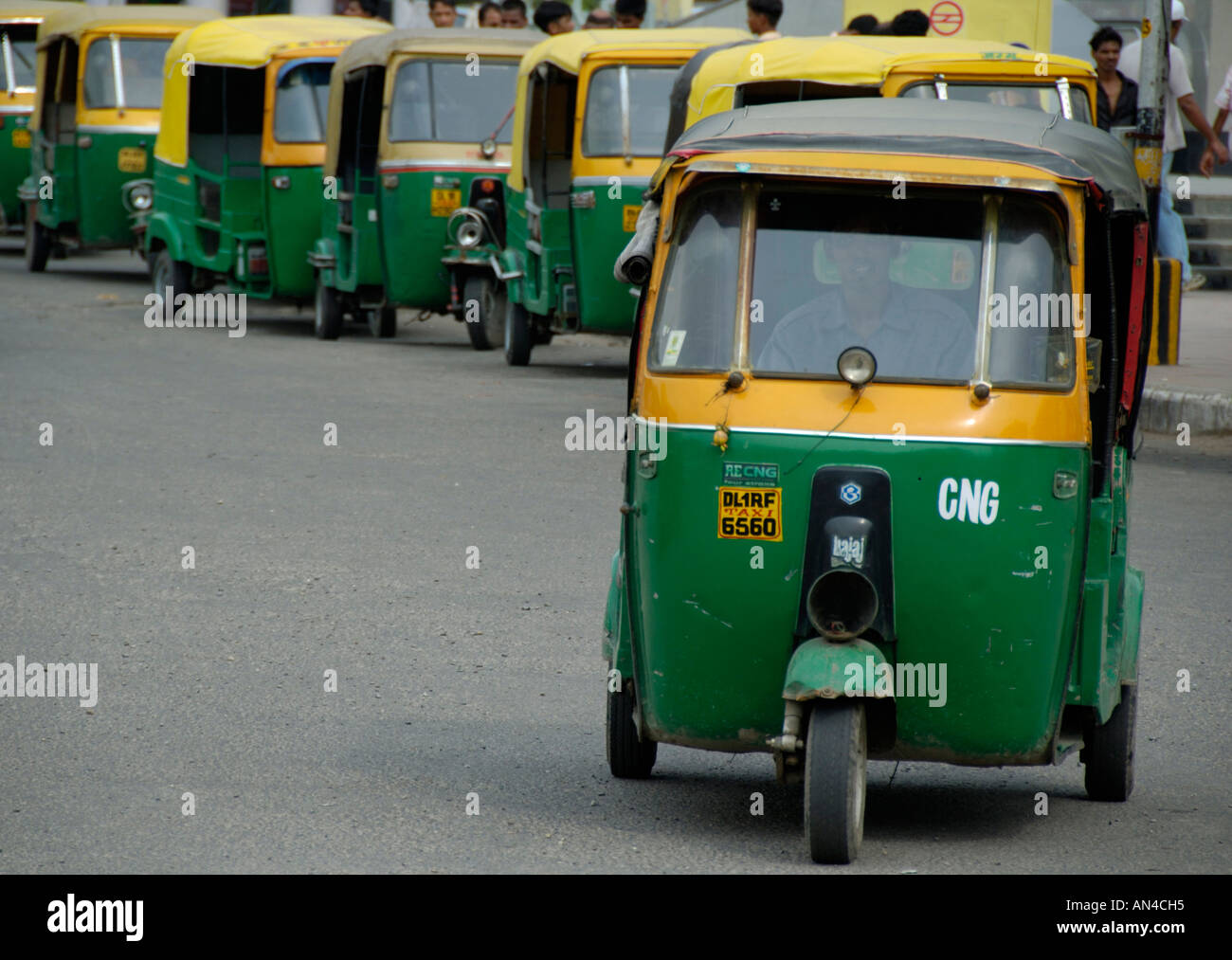 Driving yellow auto rickshaw hi-res stock photography and images - Alamy