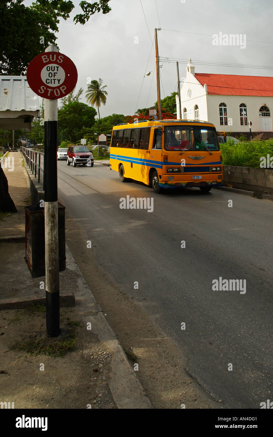 Local Yellow Bus At Bus Stop West Coast Barbados WI Stock Photo - Alamy
