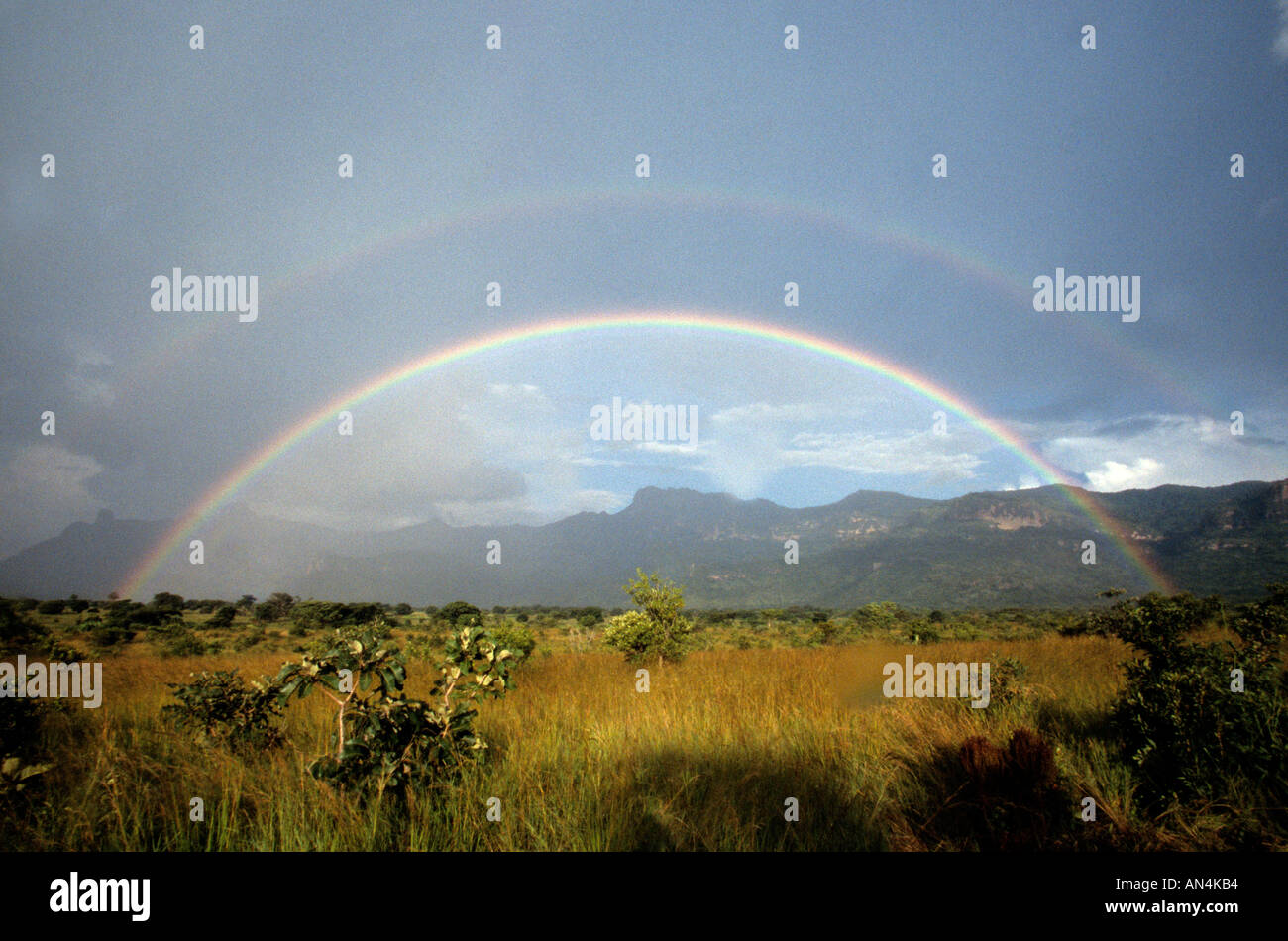 Rainbow over park, Karamoja, Uganda, Africa Stock Photo - Alamy