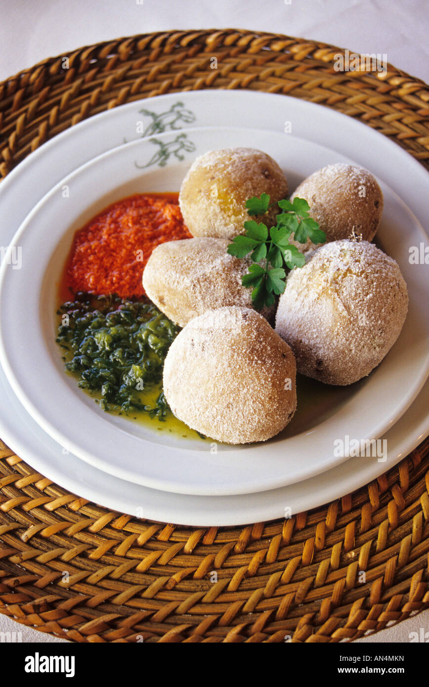 Papas or potatoes with green and picon red mojo in Restaurant Costa ...