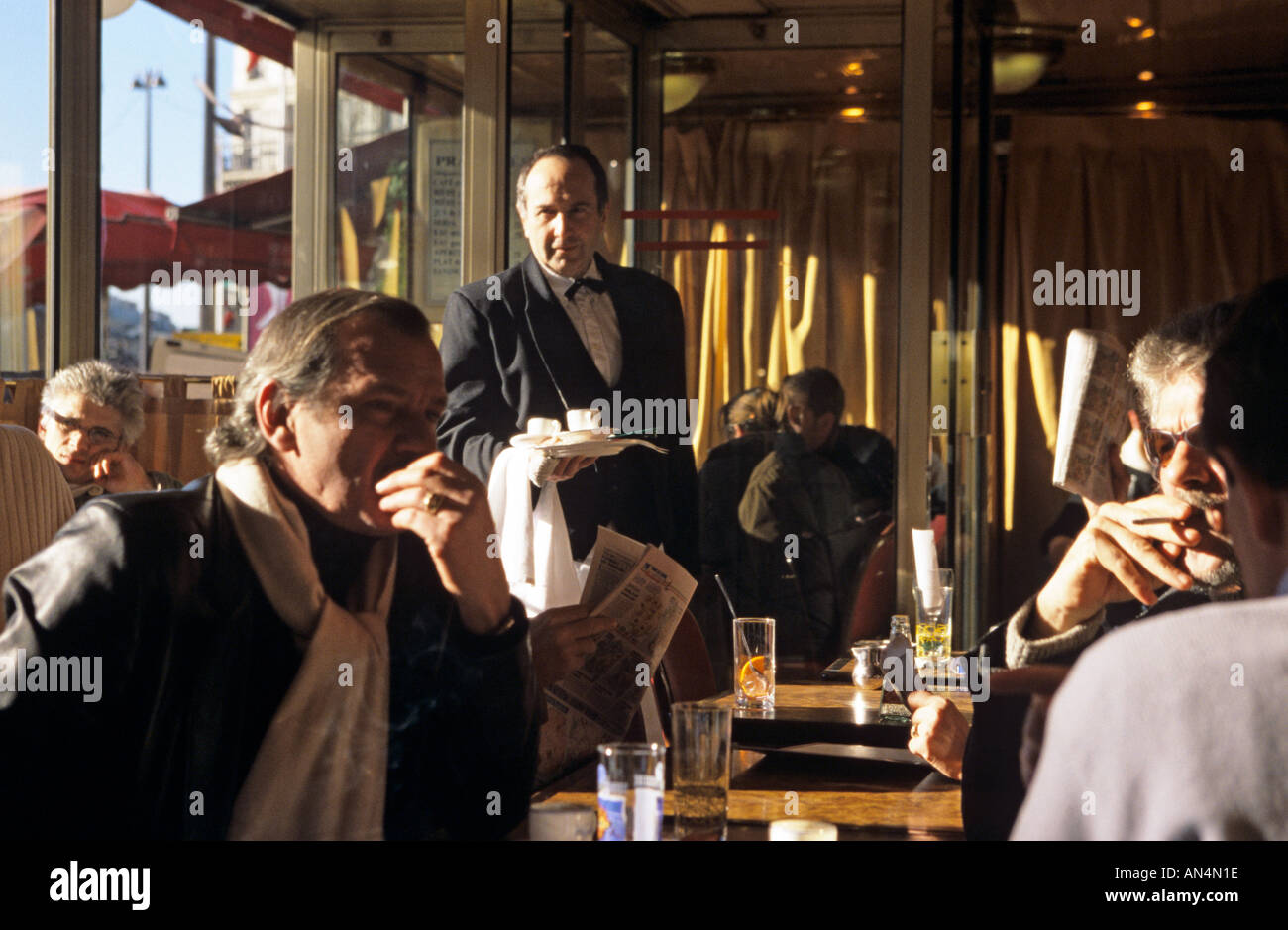 French waiter smoking hi-res stock photography and images - Alamy