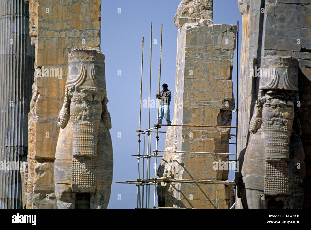 Scaffolder preparing scaffold for preservation work on ruins of the ...