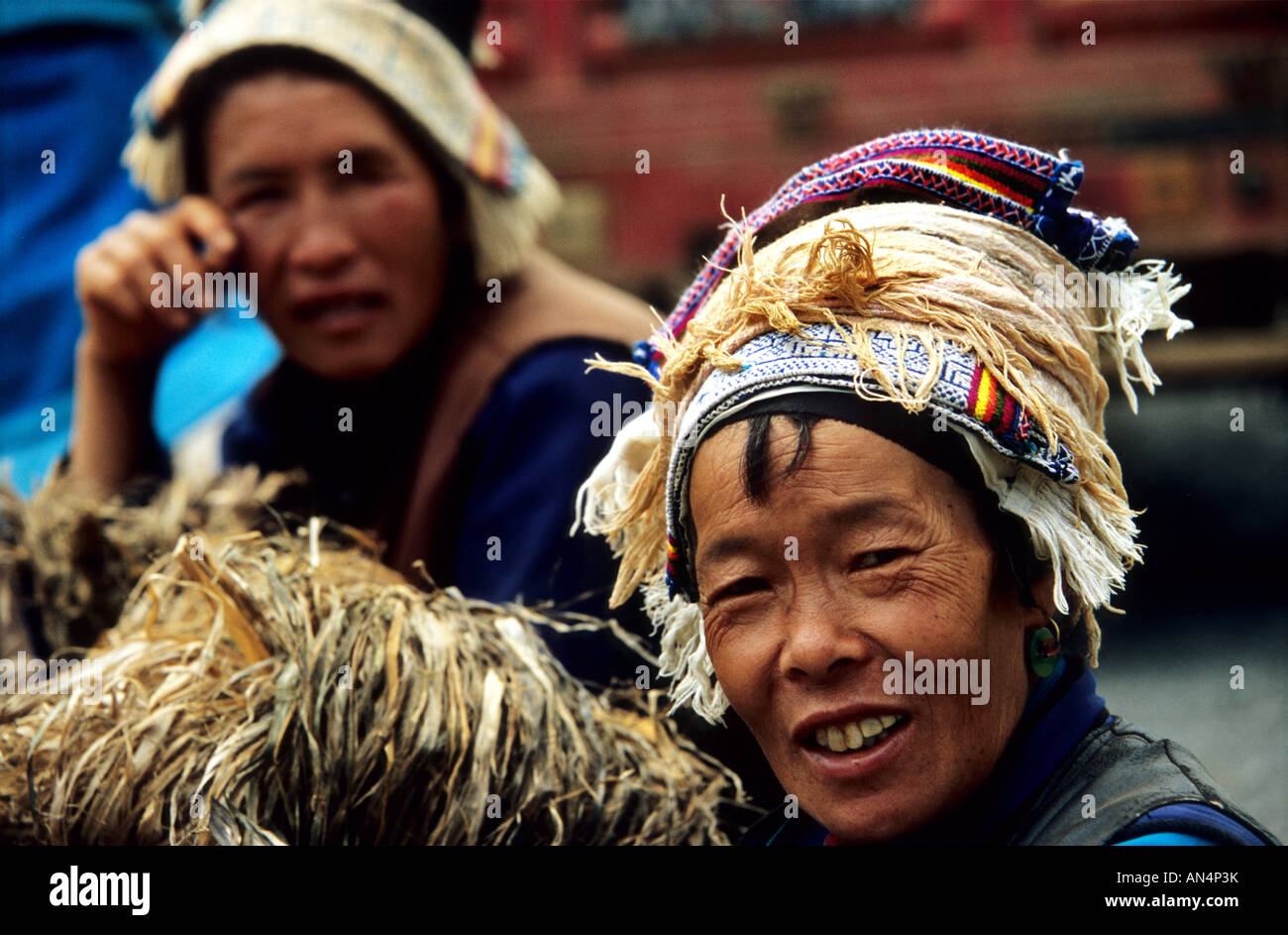Bai women in a local market in rural Yunnan, China Stock Photo - Alamy