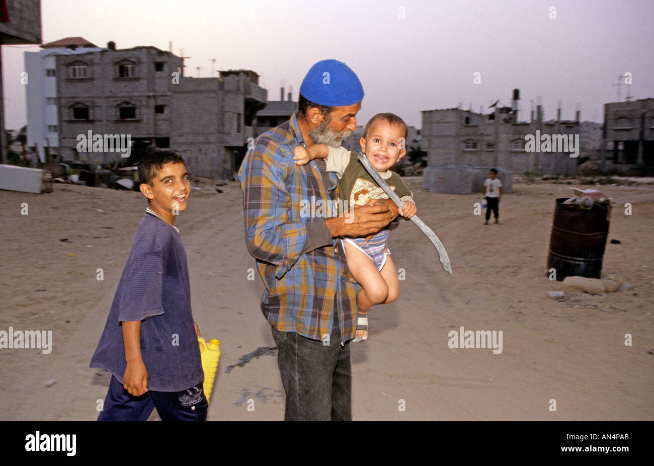 Father and sons on street, Gaza, Palestine Stock Photo - Alamy